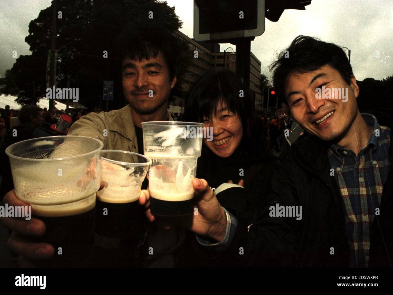 Japanese fans enjoy their Guinness before the match Stock Photo - Alamy