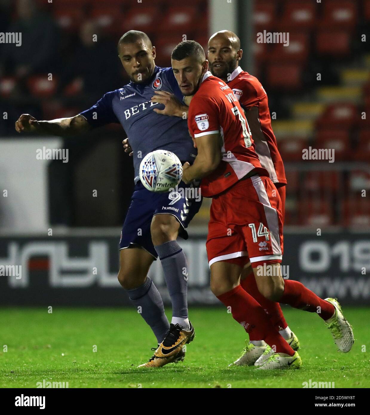 Walsall's James Wislon (right) and Charlton Athletic's Tarique Fosu ...