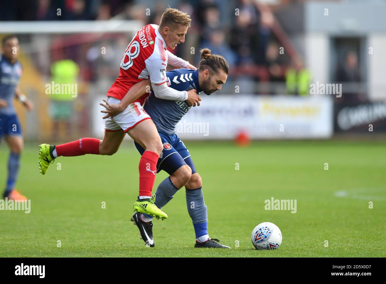 Fleetwood's George Glendon and Charlton's Ricky Holmes compete for ...