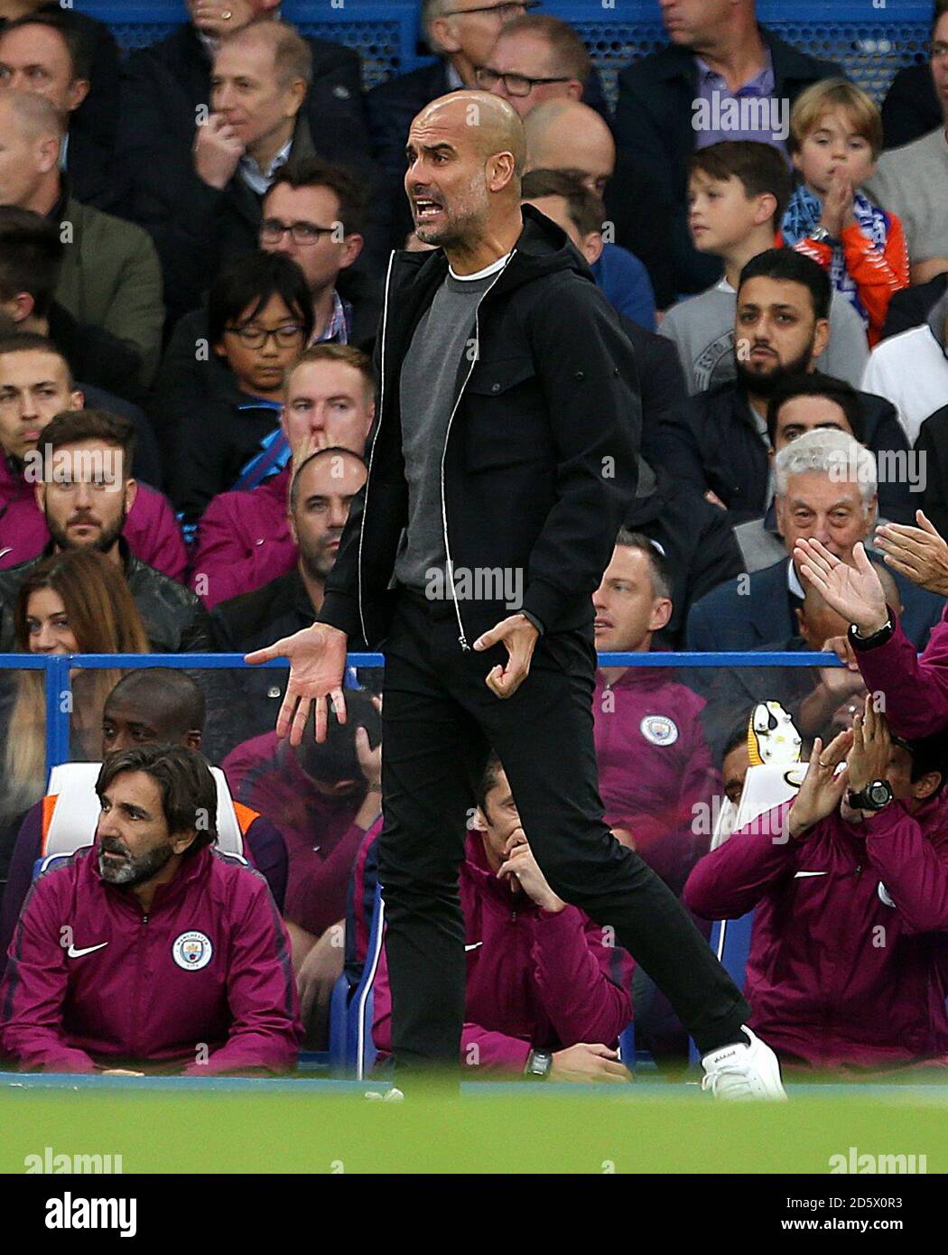 Manchester City manager Pep Guardiola gestures on the touchline Stock ...