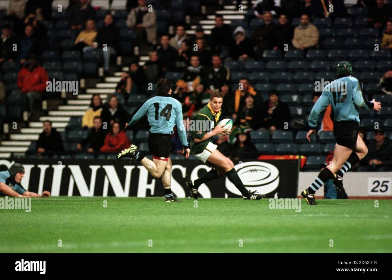 South Africa's Robbie Fleck on the charge against Uruguay Stock Photo ...