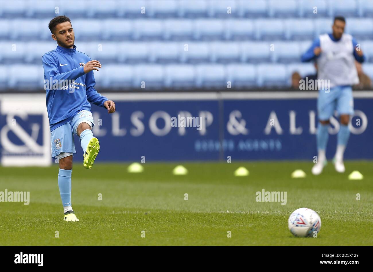 Coventry's Devon Kelly-Evans warms up Stock Photo - Alamy