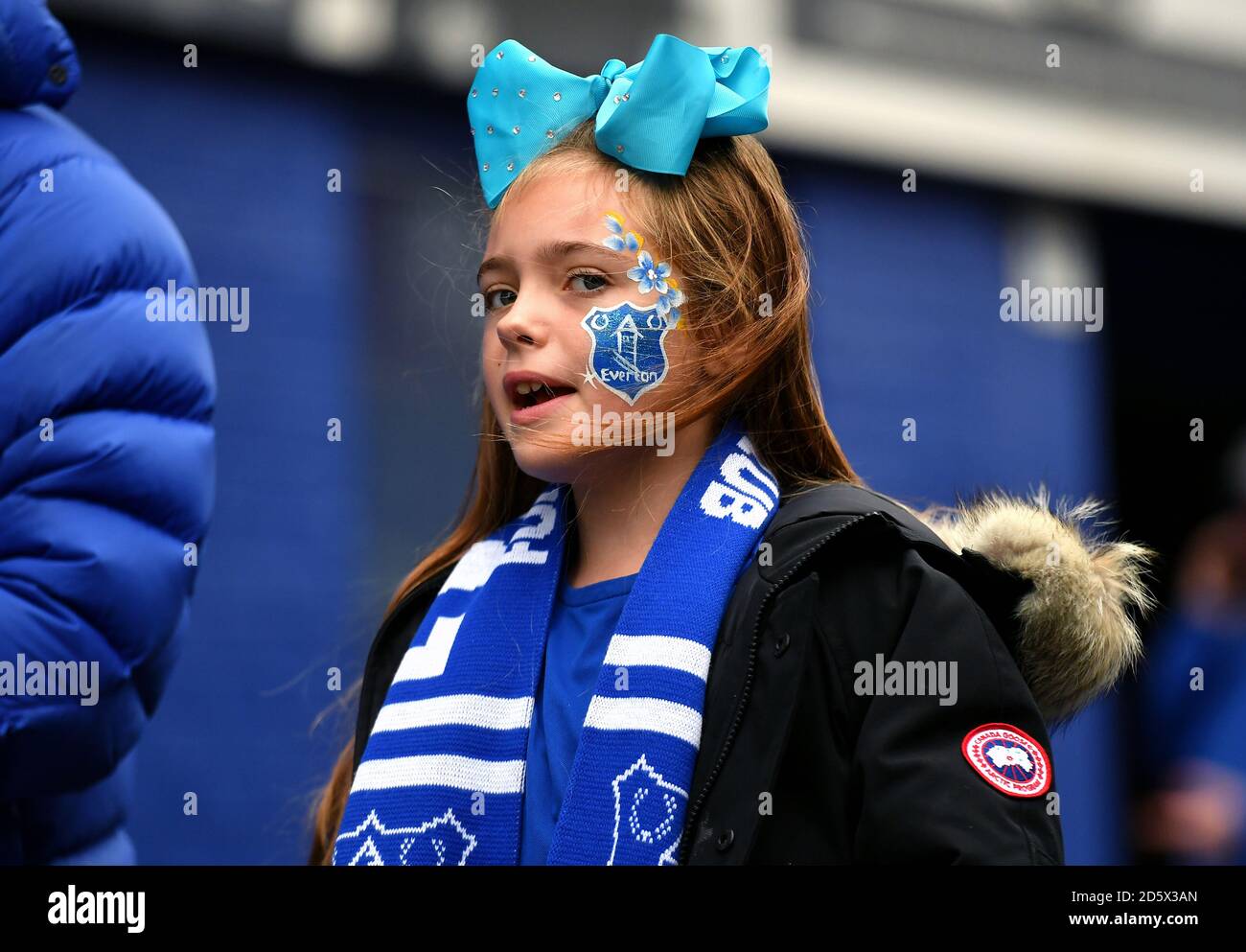 A young Everton fan shows her support Stock Photo - Alamy