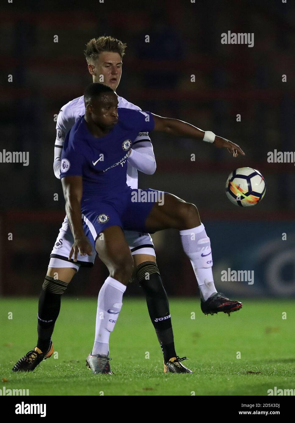 Chelsea's Victor Adeboyejo, right battles for possession of the ball ...