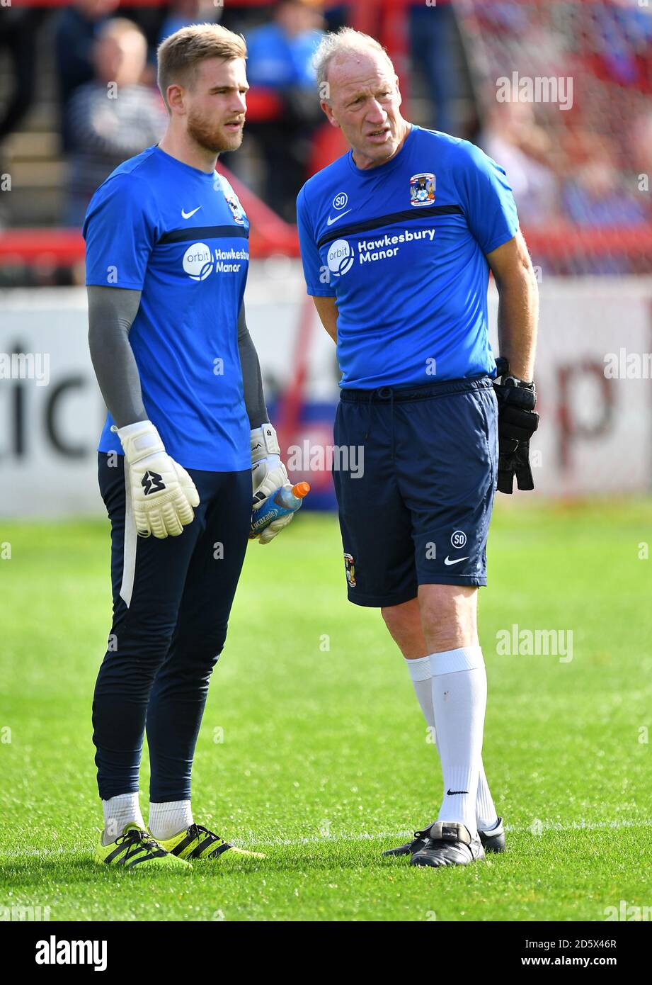 Coventry City goalkeeper Lee Burge (left) speaks with Coventry City ...