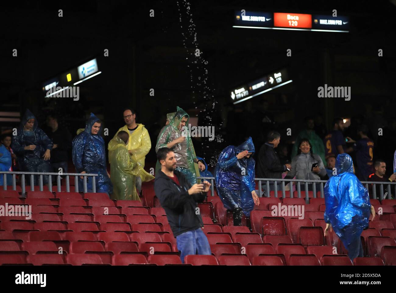 Champions league fans rain hi-res stock photography and images - Alamy