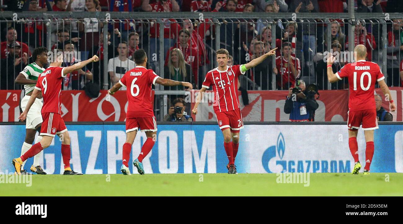 Bayern Munich's Thomas Muller (25) celebrates scoring his side's first ...