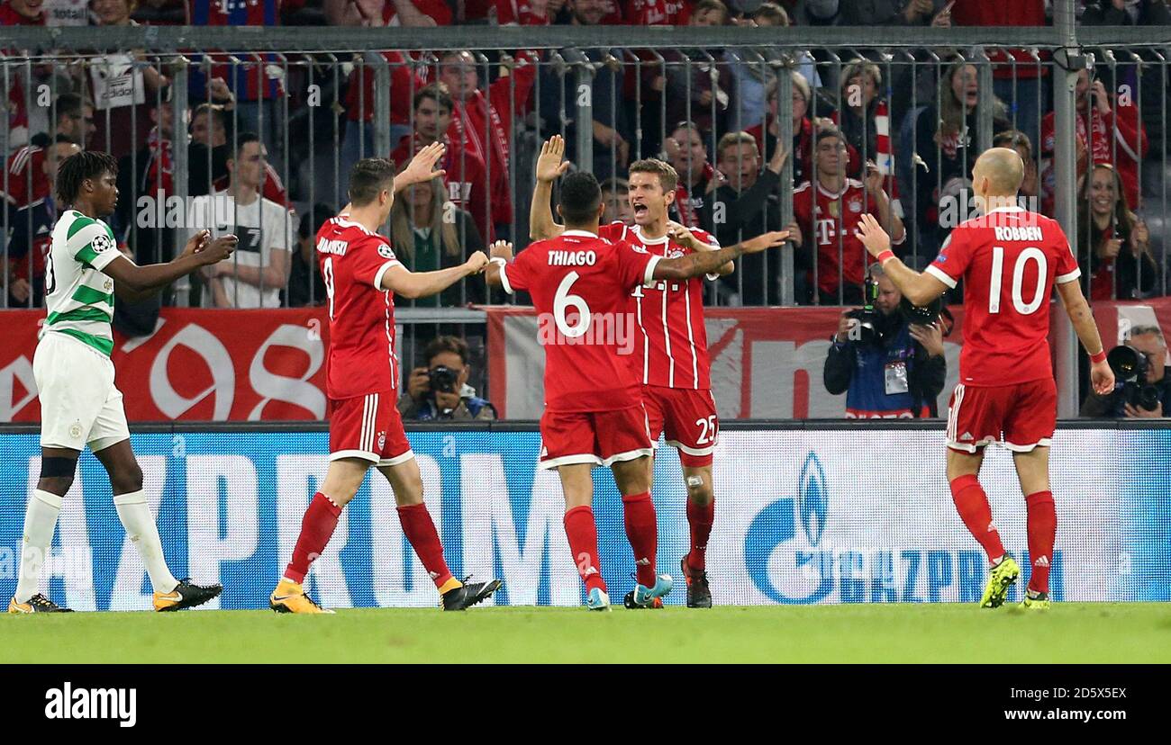 Bayern Munich's Thomas Muller (25) celebrates scoring his side's first ...
