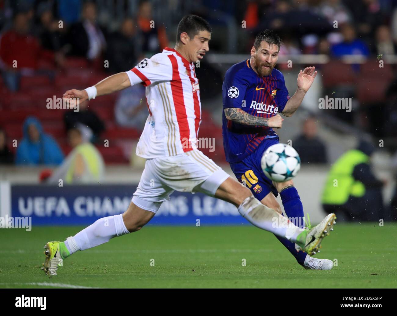 Barcelona's Lionel Messi (right) shoots for goal Stock Photo - Alamy