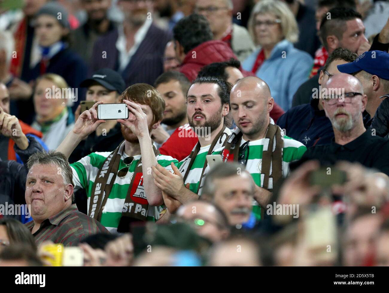 Celtic fans amounst the Bayern Munich fans in the stands Stock Photo ...