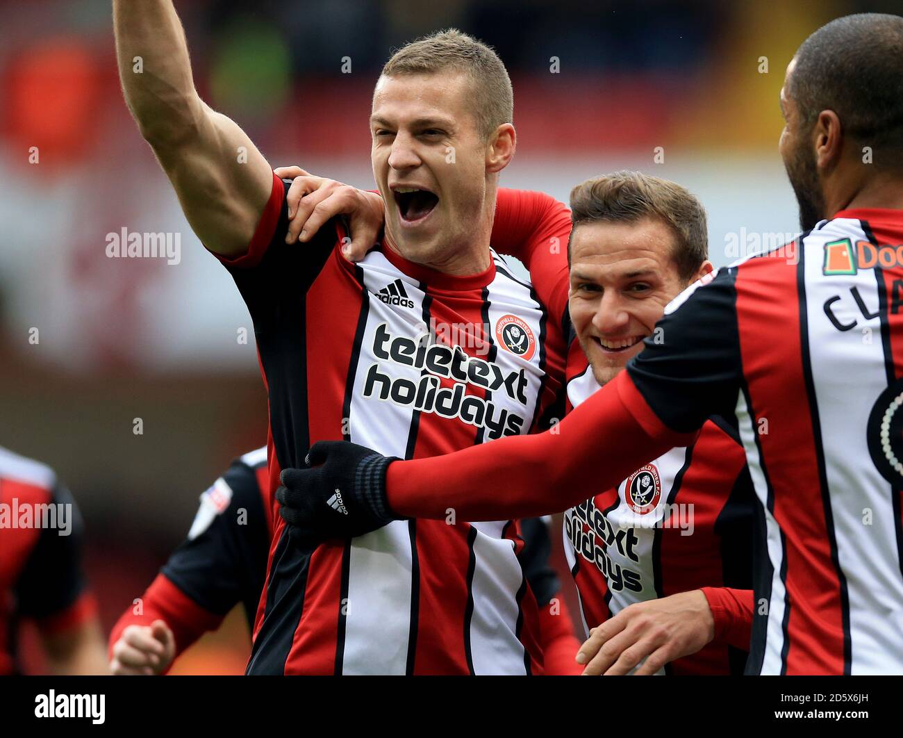 Sheffield United's Paul Coutts (Left) celebrates after he scores his ...