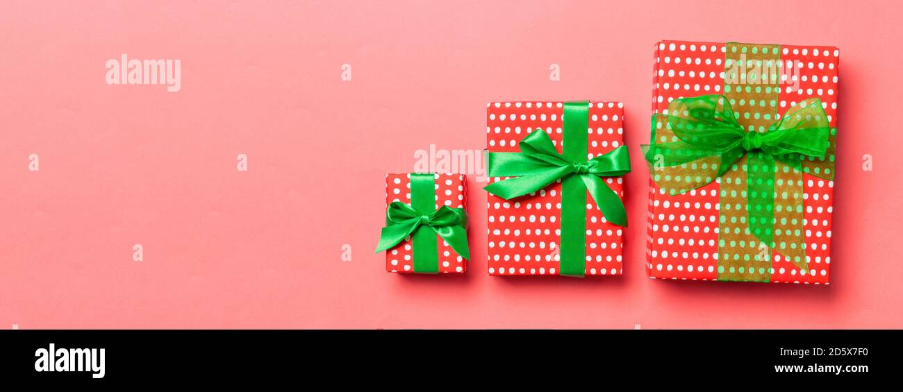wrapped Christmas or other holiday handmade present in paper with green ...