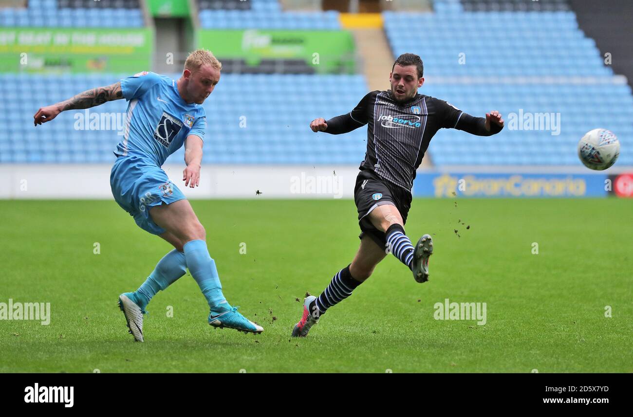 Coventry City's Jack Grimmer (left) and Colchester United's Drey Wright ...