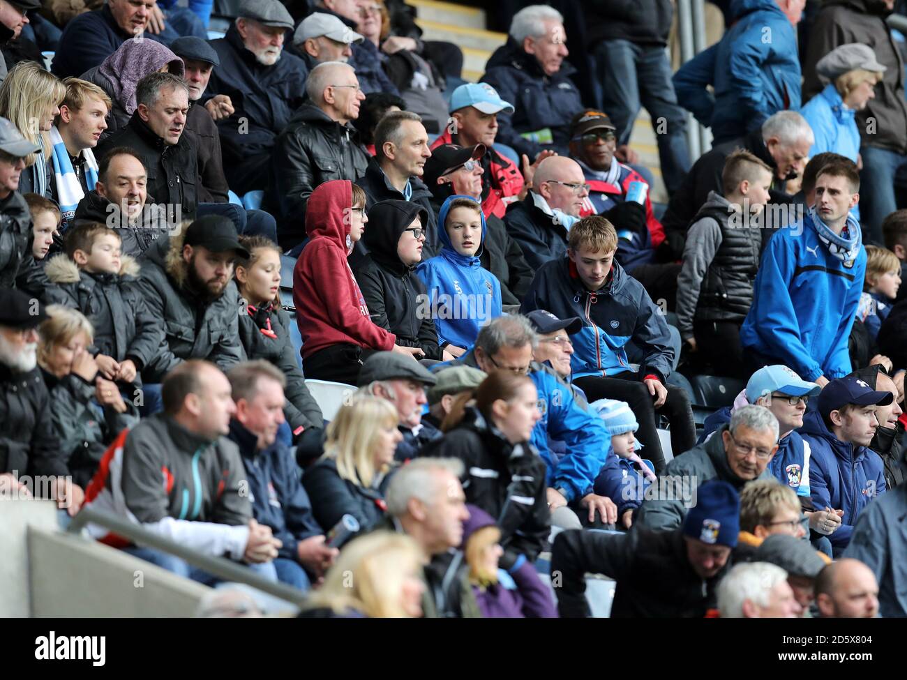Coventry City fans in the stands Stock Photo - Alamy