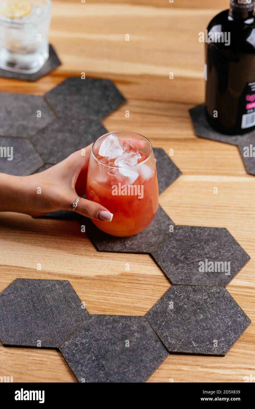 Orange mocktail on red background hi-res stock photography and images ...