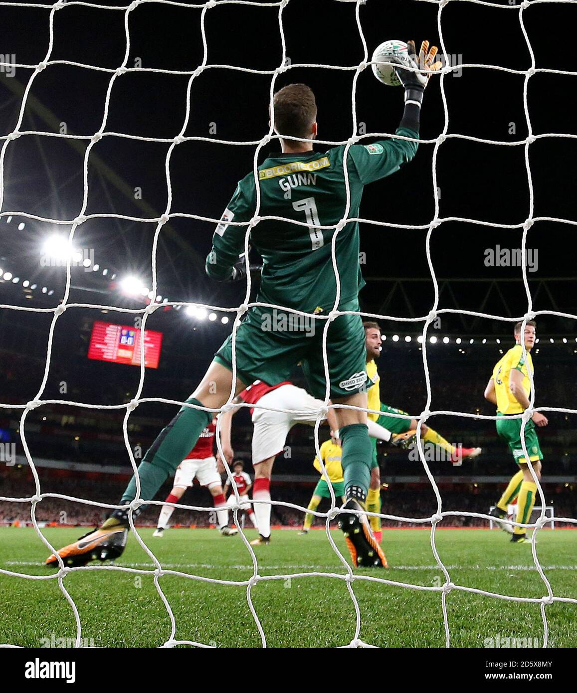 Norwich City goalkeeper Angus Gunn makes a save from Arsenal's Rob ...