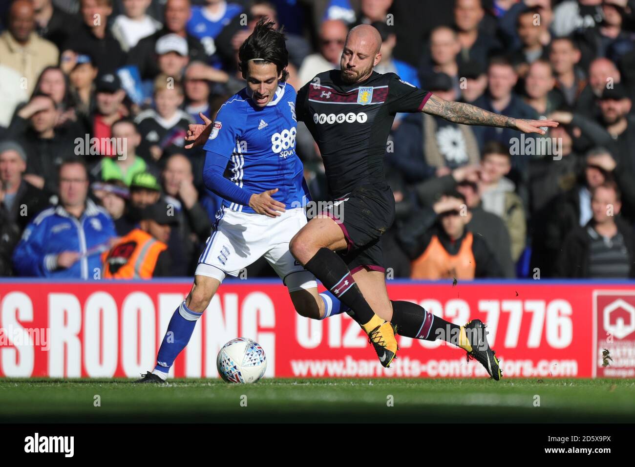 Birmingham City's Jota and Aston Villa's Alan Hutton battle for the ...