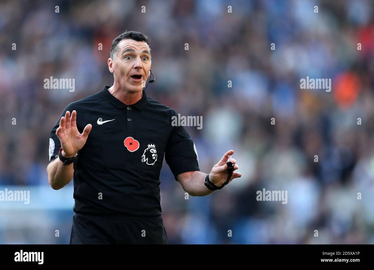 Match referee Neil Swarbrick gestures Stock Photo - Alamy
