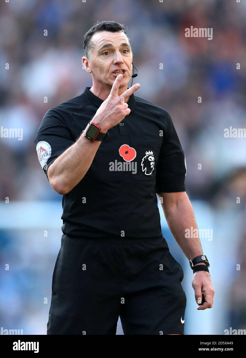 Match referee Neil Swarbrick gestures Stock Photo - Alamy