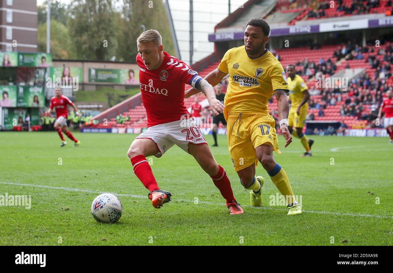 Charlton Athletic's Chris Solly (left) and AFC Wimbledon's Andy Barcham ...