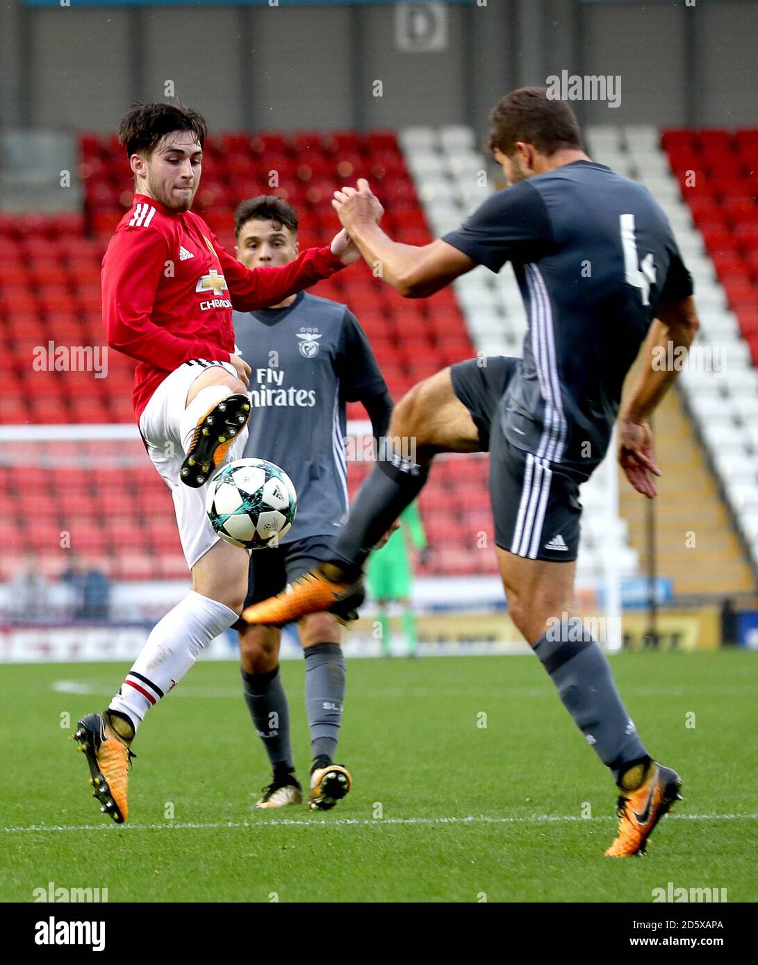 Manchester United's Aidan Barlow (left) and Benfica's Goncalo Joao ...
