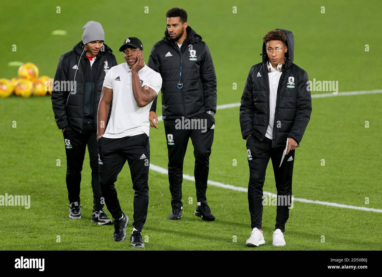 Middlesbrough's Adama Traore(front L) and team mates on the pitch ...