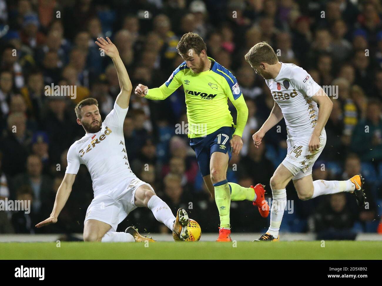 Leeds United's Stuart Dallas (left) and Eunan O'Kane (right) challenge ...
