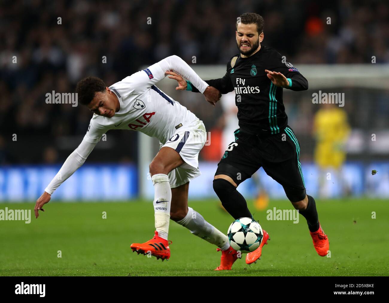Tottenham Hotspur's Dele Alli (left) and Real Madrid's Nacho battle for ...