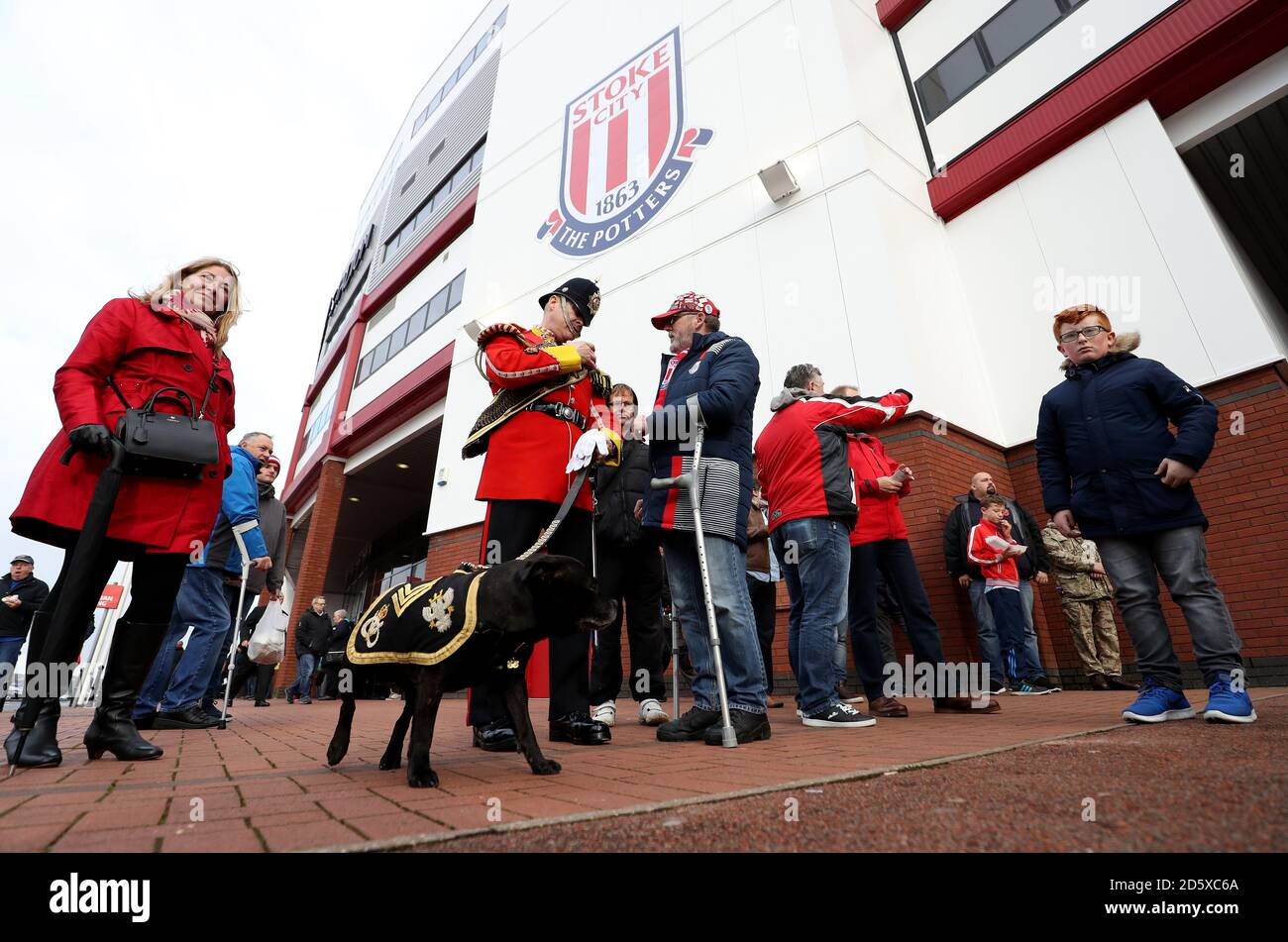 Stoke City fans with members of the military Stock Photo - Alamy
