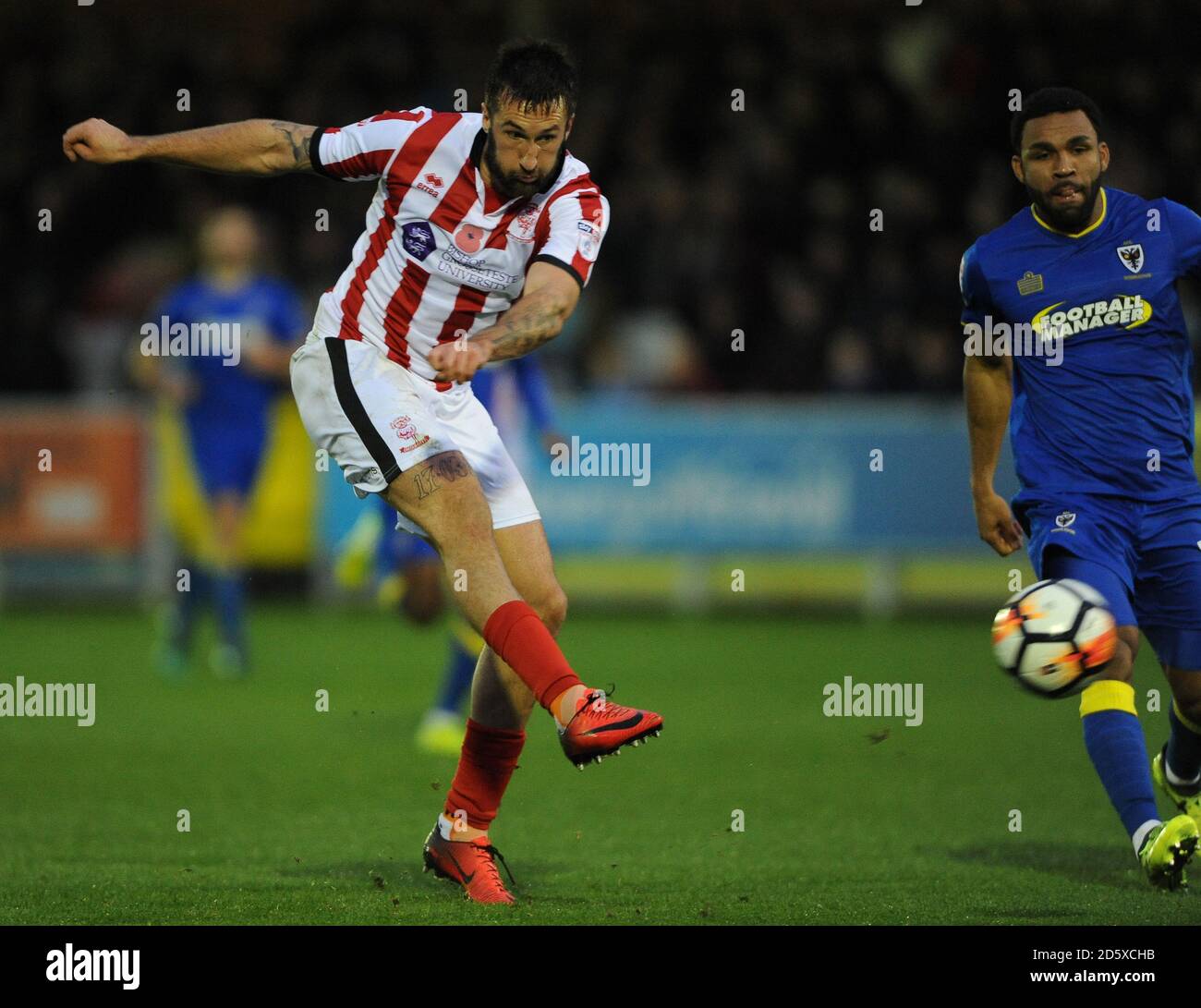 Lincoln City's Ollie Palmer shoots for goal Stock Photo - Alamy