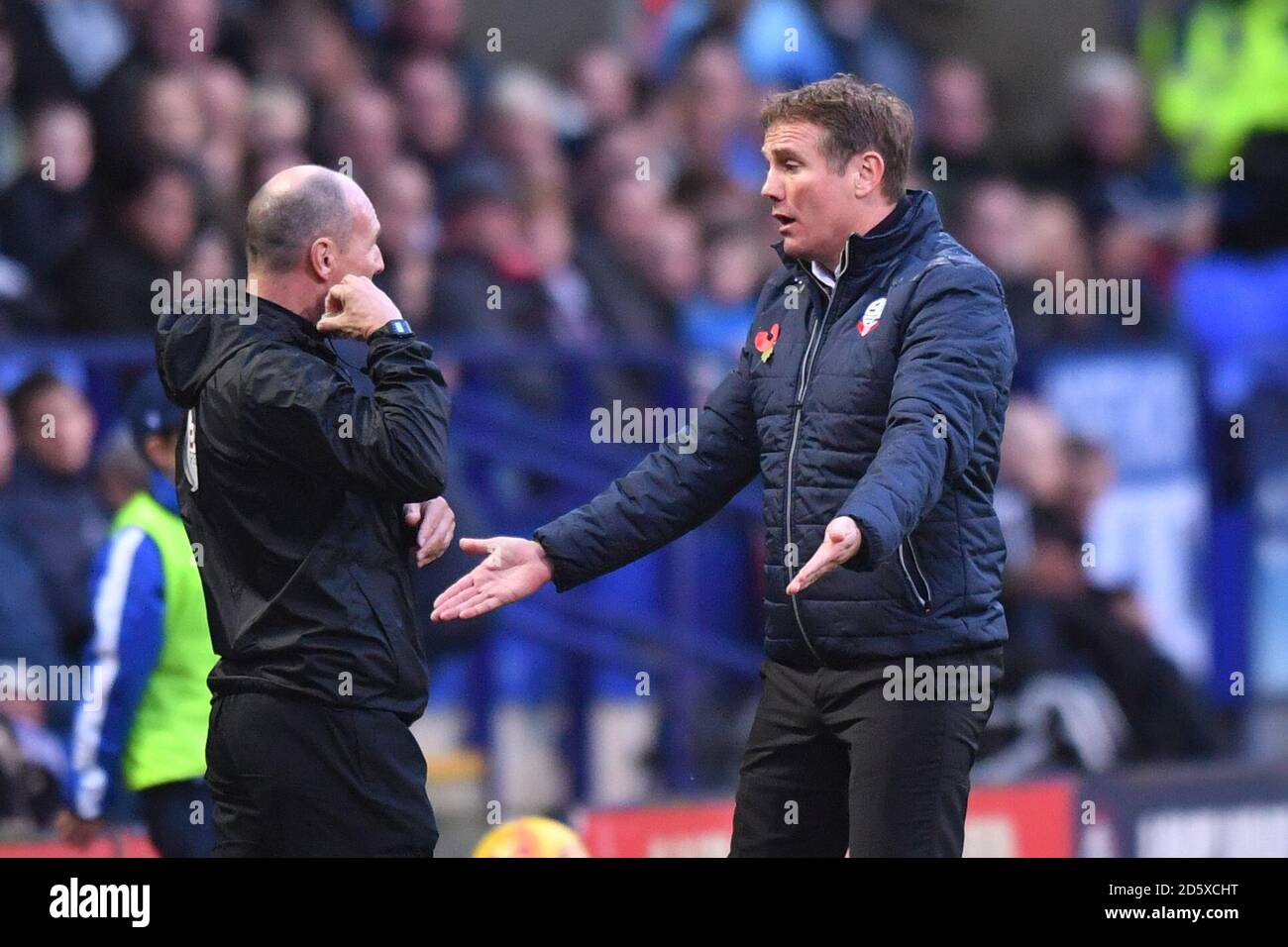 Bolton Wanderers manager Phil Parkinson speaks with the fourth official ...
