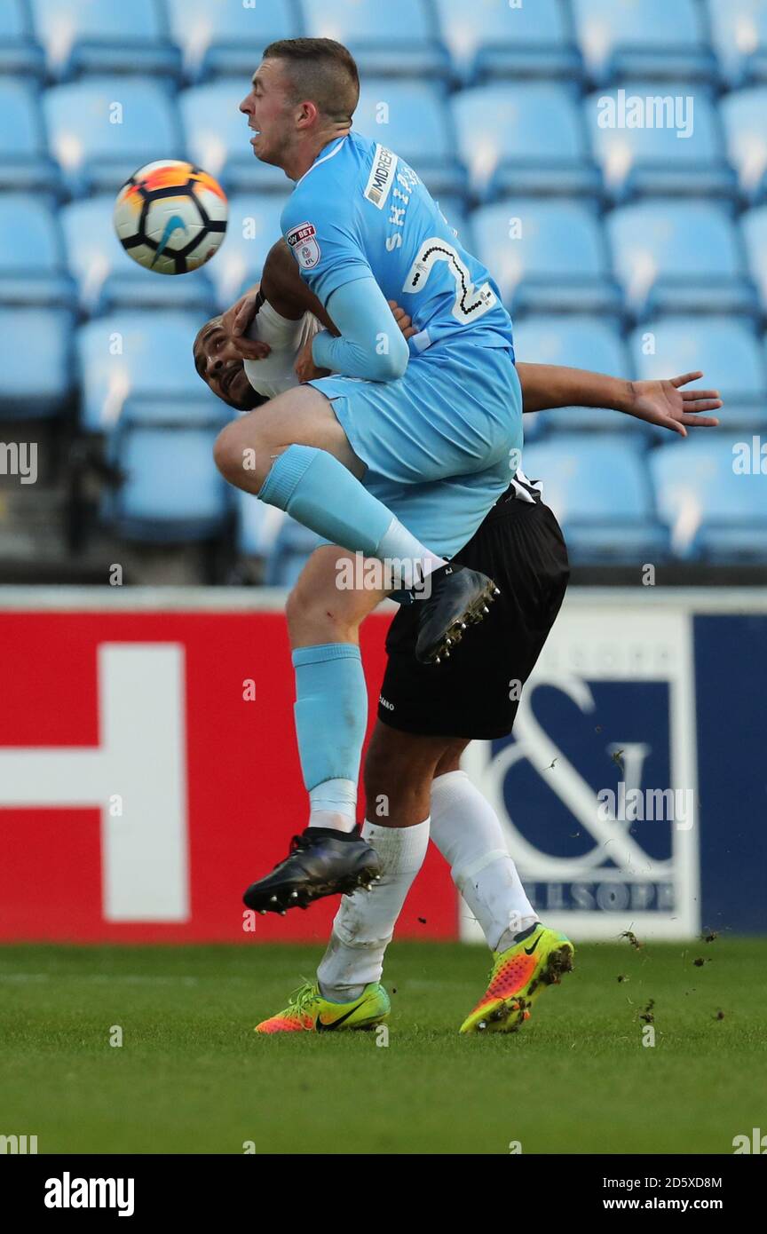Coventry City's Jordan Shipley tussles with Maidenhead United's James ...