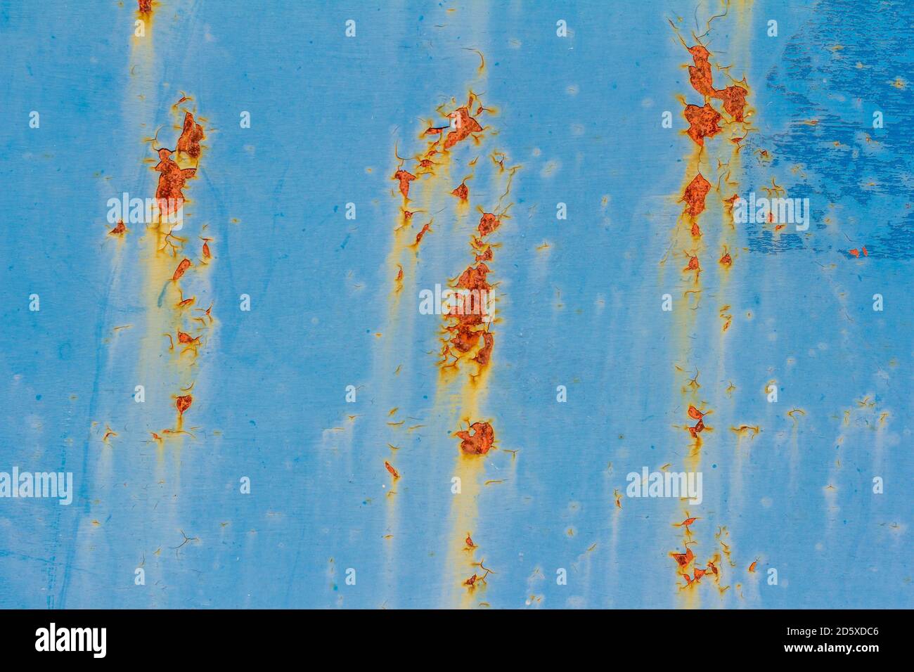 Rusty blue metal wall. Blue metal background with spots and streaks of ...