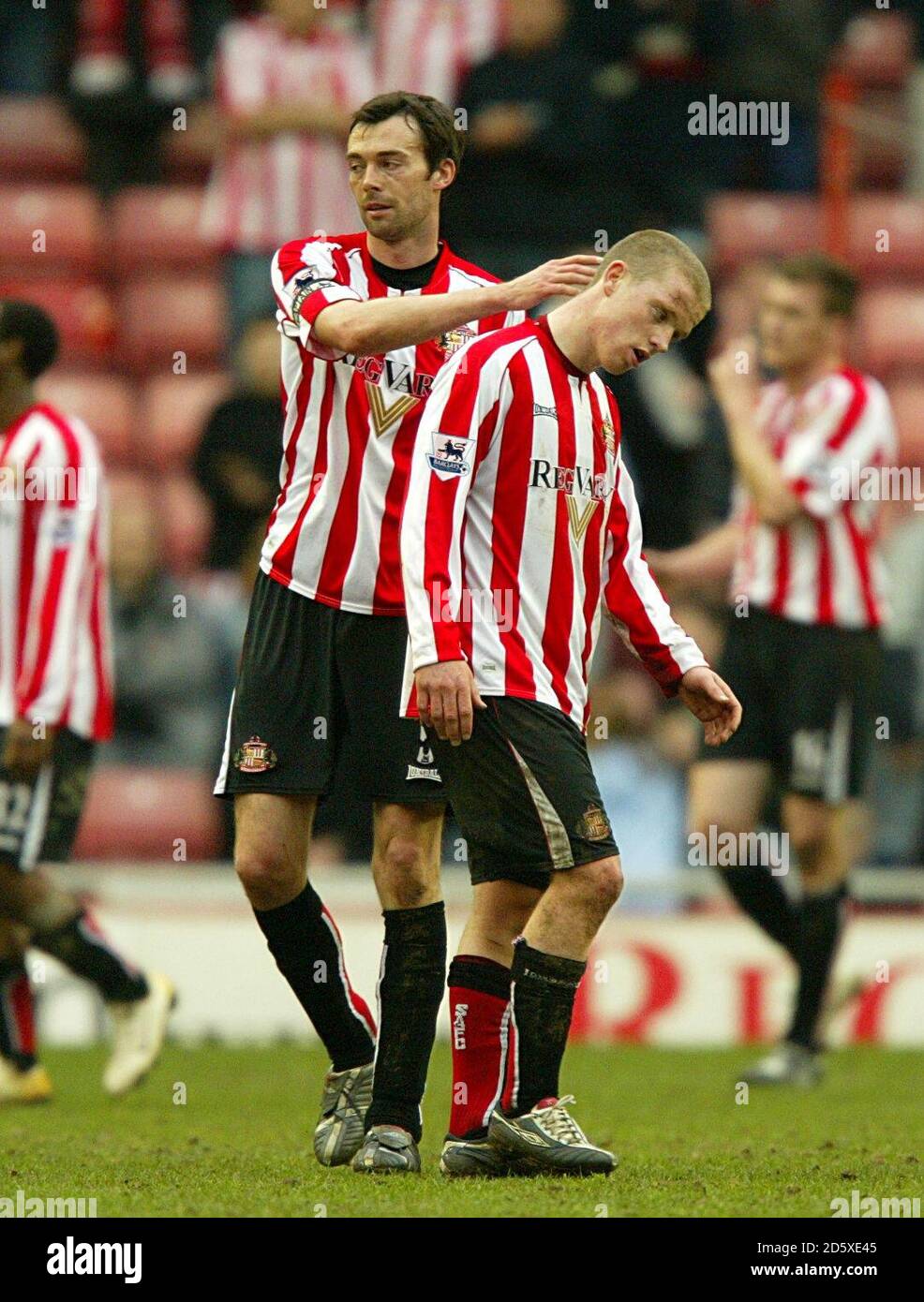 Sunderland's Grant Leadbitter is consoled by team mate Gary Breen Stock ...