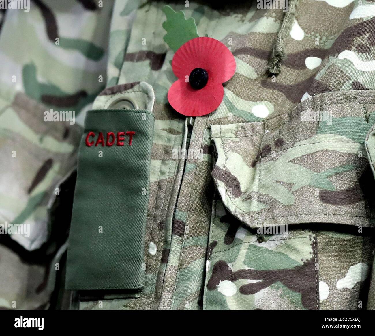 An Army cadet wears a poppy Stock Photo - Alamy