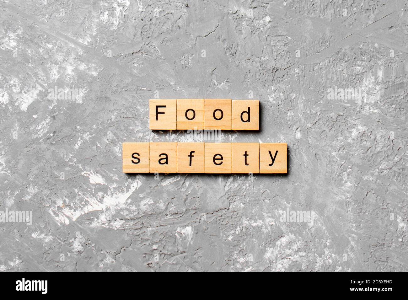 food safety word written on wood block. food safety text on table ...