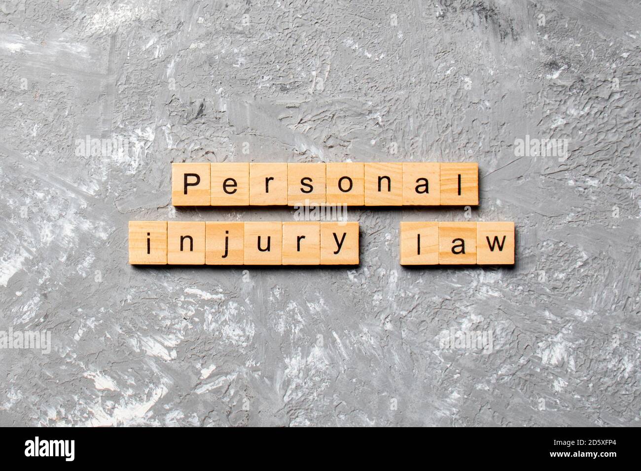 personal injury law word written on wood block. personal injury law ...
