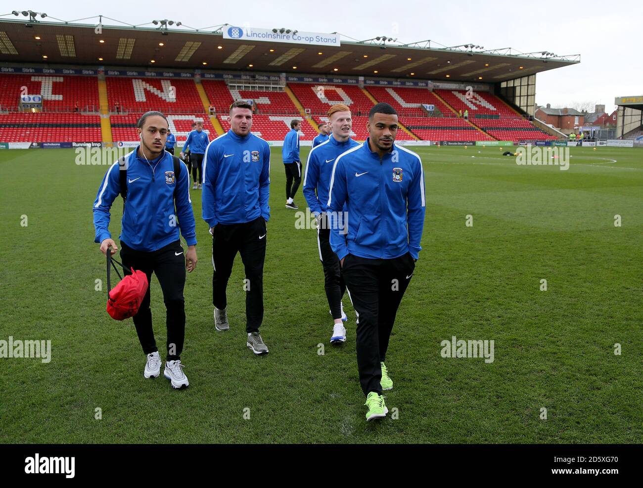Coventry City's players take to the pitch ahead of the Lincoln match ...