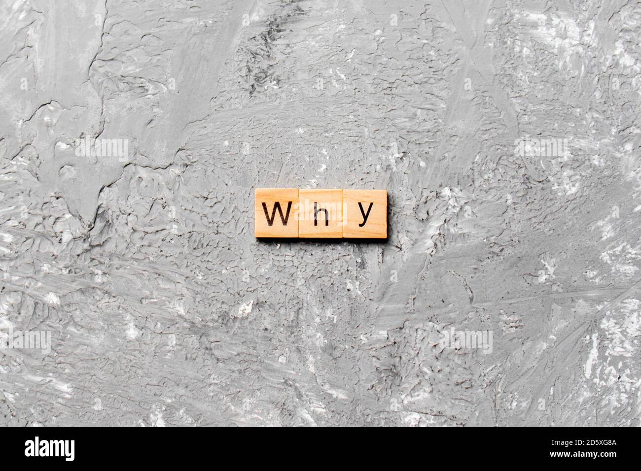 WHY word written on wood block. WHY text on cement table for your ...