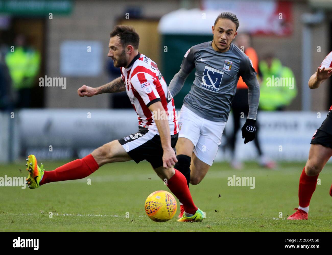 Coventry City's Jodi Jones turns Lincoln City's Neal Eardley Stock ...