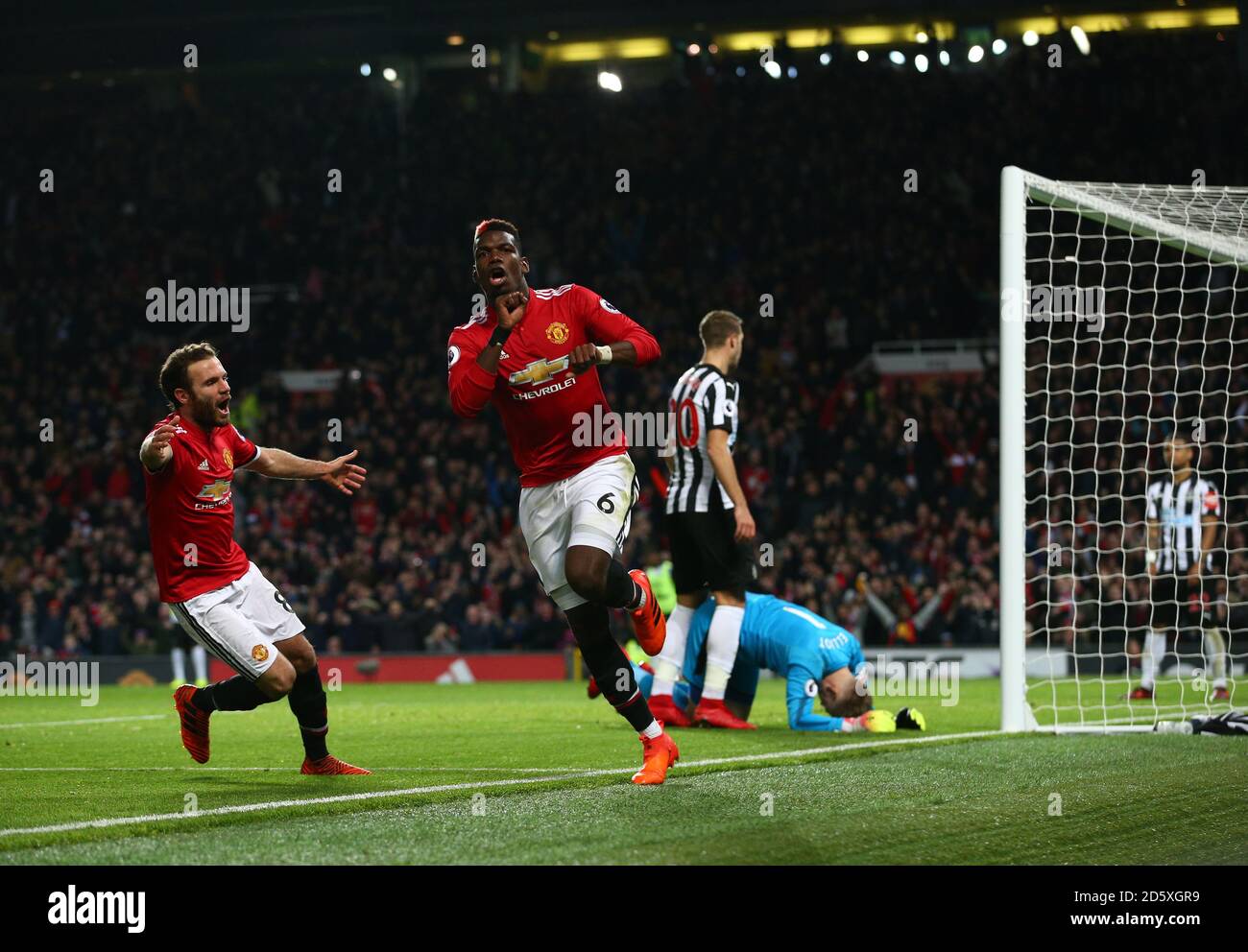 Manchester United's Paul Pogba celebrates scoring his side's third goal ...