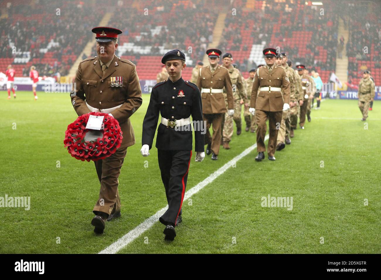Remembrance proceeding before kick off Stock Photo - Alamy