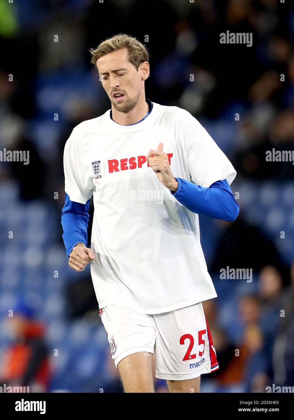 Stoke City's Peter Crouch warms-up before kick-off Stock Photo - Alamy