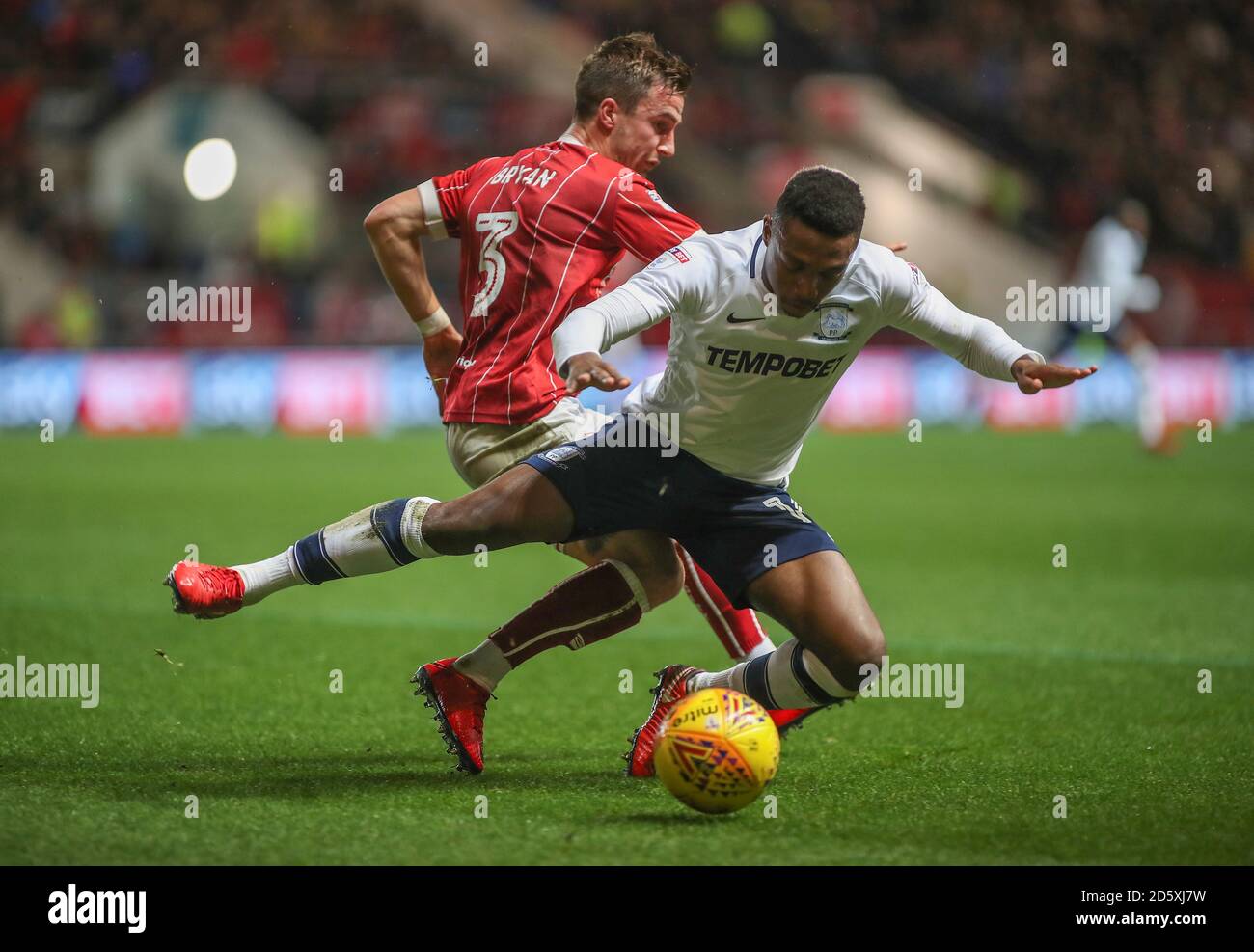 Bristol City's Joe Bryan and Preston North End's Darnell Fisher battle ...