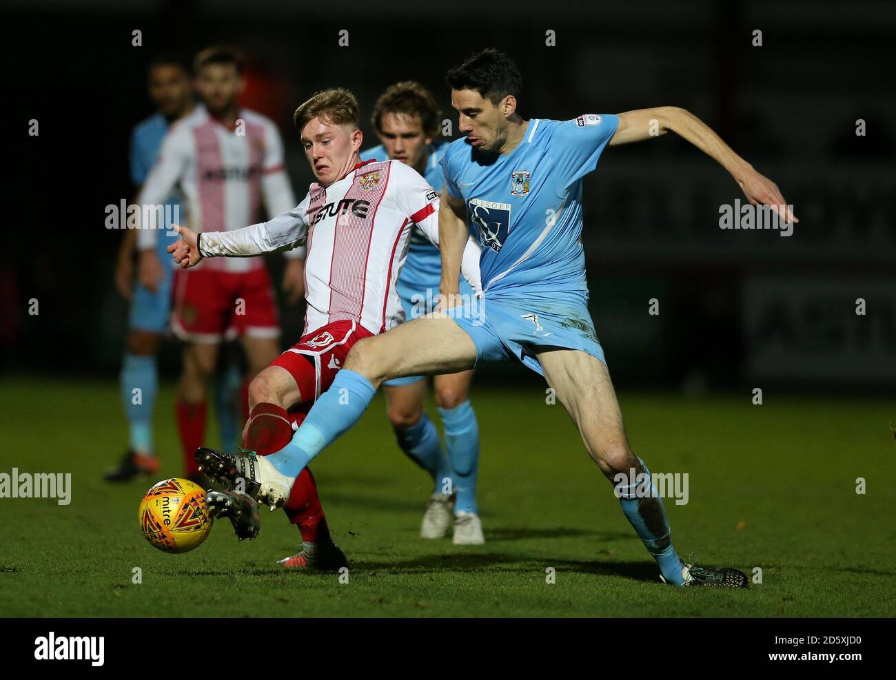 Coventry City's Peter Vincenti and Stevenage FC's Mark McKee battle for ...