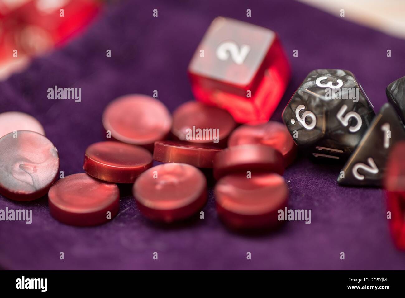 Close up photography of role playing game dices and tokens lying on a ...