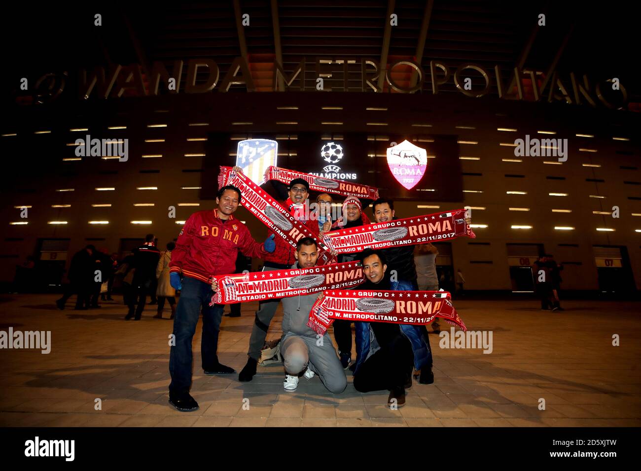 Roma fans pose for a photo outside of the stadium prior to the match ...