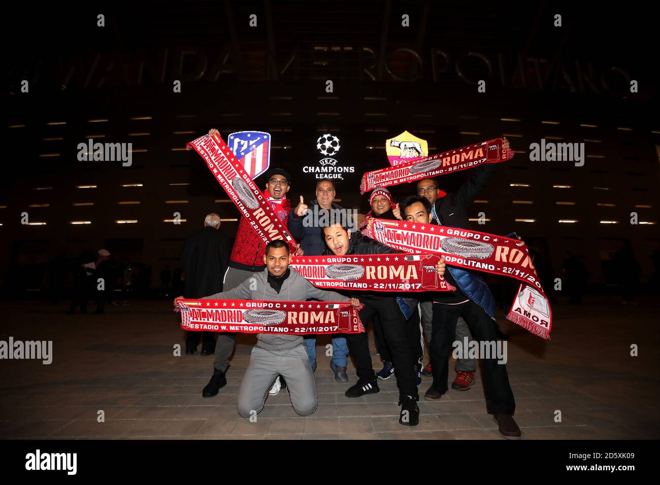 Roma fans pose for a photo outside the stadium prior to the match Stock ...