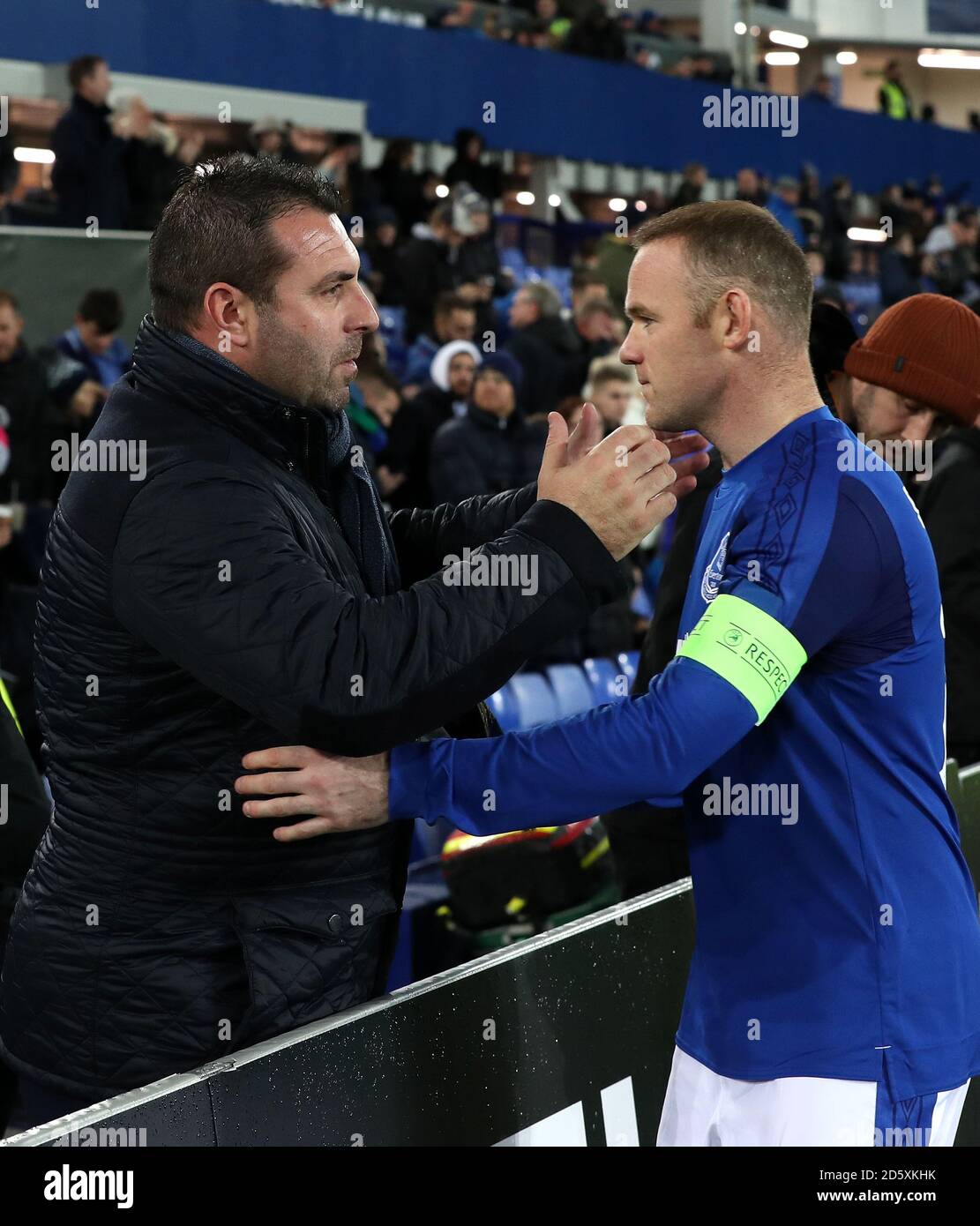 Everton manager David Unsworth speaks with Everton's Wayne Rooney prior ...