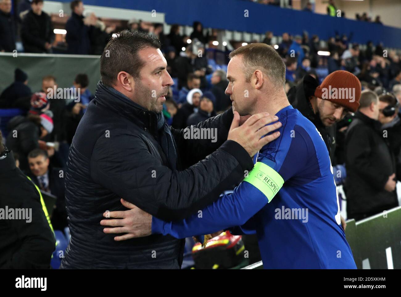 Everton manager David Unsworth speaks with Everton's Wayne Rooney prior ...